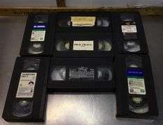 Muscat Crate With VHS Tapes - Sherwood Auctions