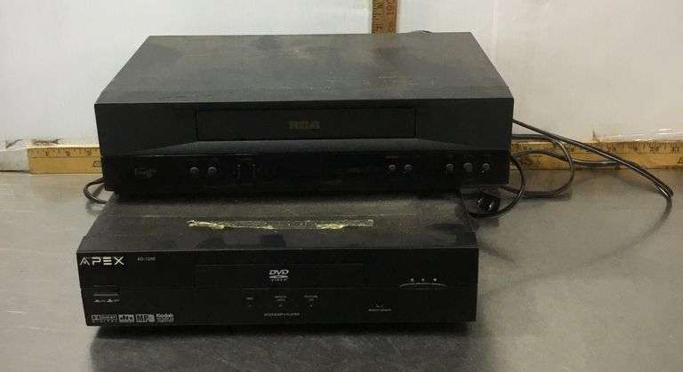 APEX DVD Player and RCA VHS Player (both have power) - Sherwood Auctions