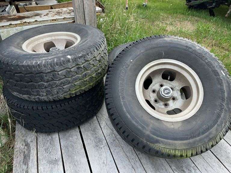 Four Dayton Timberline A/T 33X12.5OR15LT Tires w/ Rims - Sherwood Auctions