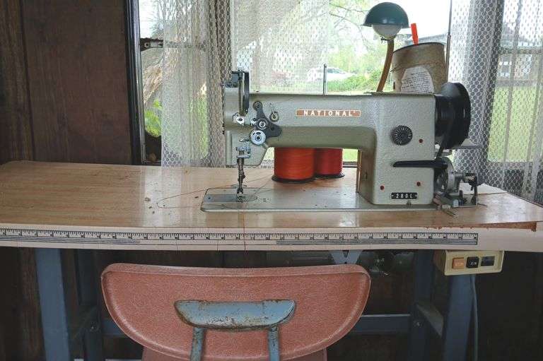 National Sewing Machine & 48"×20" Table - Sherwood Auctions