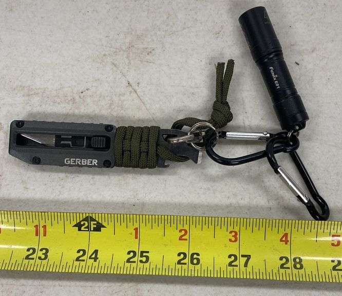 Gerber Mini Knife, and Fenix E01 Hand Flashlight - Sherwood Auctions