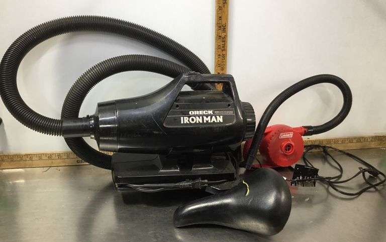 Oreck IronMan Vacuum, Coleman Quick Pump and Bike Seat - Sherwood Auctions