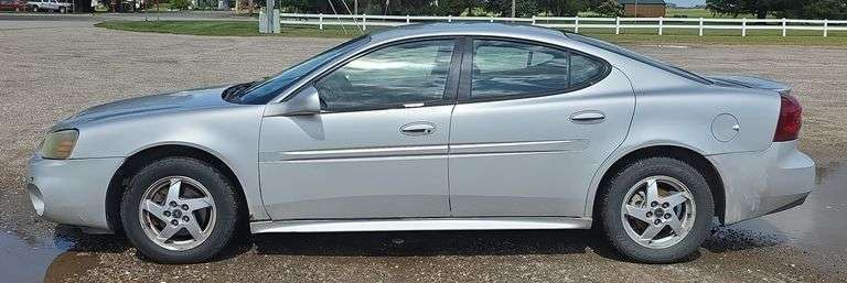 Weekly Online Auction: Grand Prix, Haybine, Ford Taurus, Deer Feeder ...