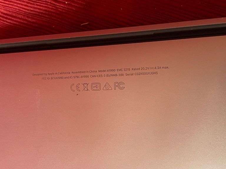 Apple MacBook Pro Model: A1990 - Sierra Auction Management Inc