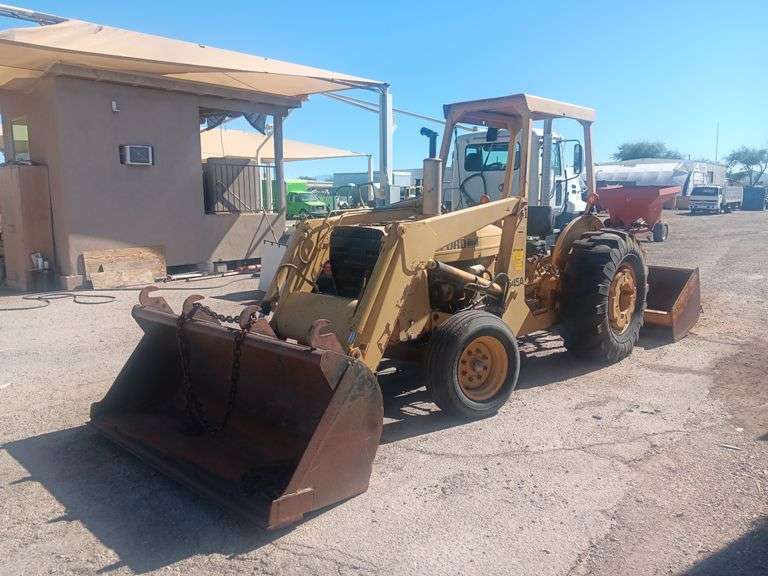 1987 Ford 545A Loader Tractor - Sierra Auction Management Inc