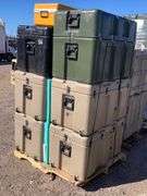 Approximately seven military style hard plastic cargo containers ...