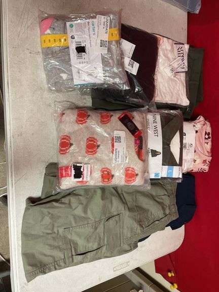 Assorted Woman, Men’s Clothes - Sierra Auction Management Inc