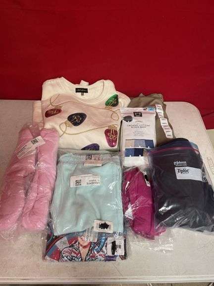 Assorted Woman, Men’s Clothes - Sierra Auction Management Inc