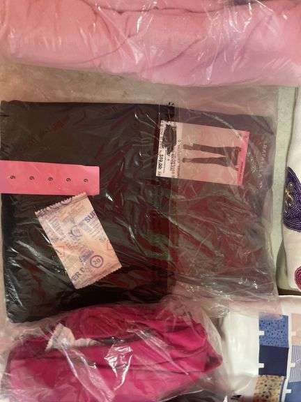 Assorted Woman, Men’s Clothes - Sierra Auction Management Inc