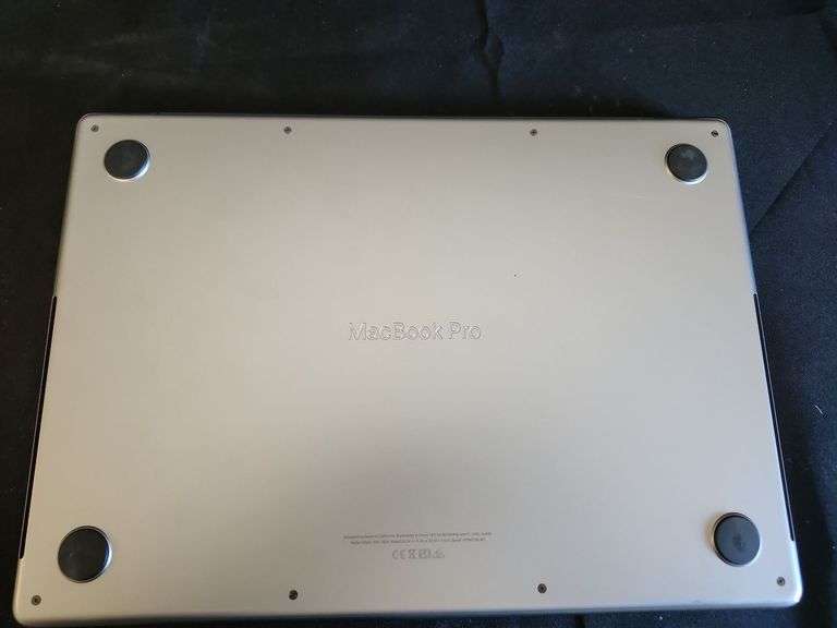 Apple MacBook Pro Model A2442 - Sierra Auction Management Inc