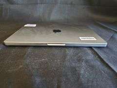Apple MacBook Pro Model A2442 - Sierra Auction Management Inc
