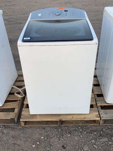 Kenmore washing machine. - Sierra Auction Management Inc