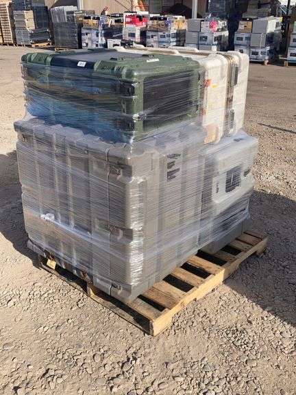 Approximately four military style hard plastic cargo containers ...