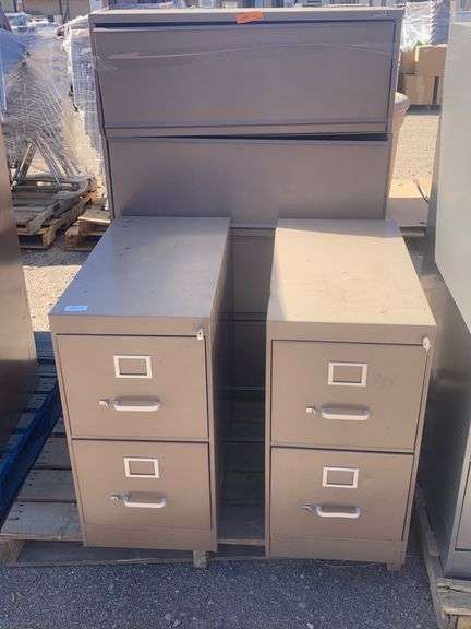 Three metal filing cabinets. - Sierra Auction Management Inc