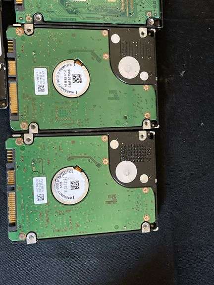 Assorted Hard Drives & Micro Chips - Sierra Auction Management Inc