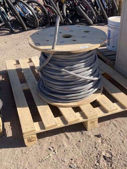 Spool of electrical copper wire. - Sierra Auction Management Inc
