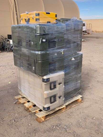 Approximately six assorted military style hard plastic cargo containers ...