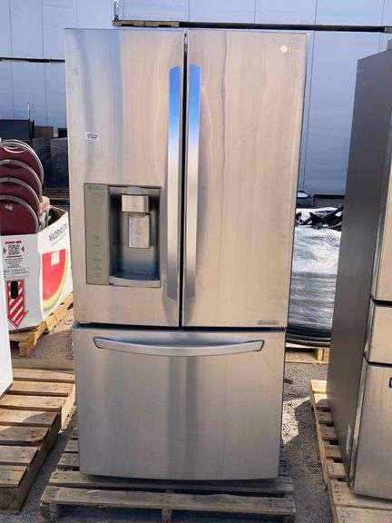 LG three door stainless refrigerator. - Sierra Auction Management Inc