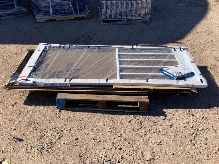 (2) Assorted metal frame screen doors. - Sierra Auction Management Inc