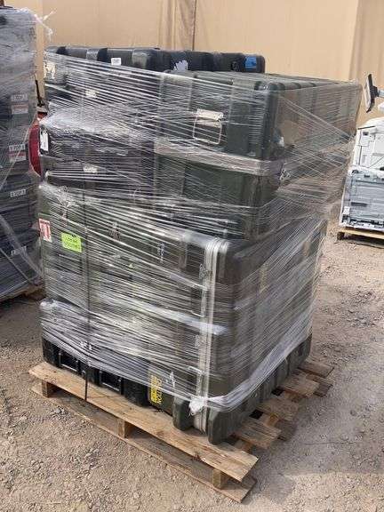 Approximately six military style hard plastic cargo containers ...