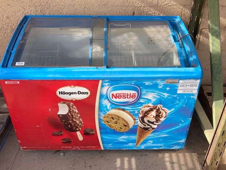 Nestlé ice cream display chest freezer. - Sierra Auction Management Inc