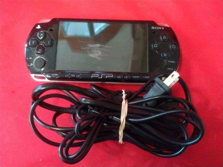 Sony PSP PSP 101 - Hand Held With Charger/ One Game - Sierra Auction ...