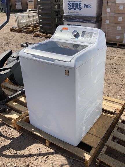 GE washing machine. - Sierra Auction Management Inc