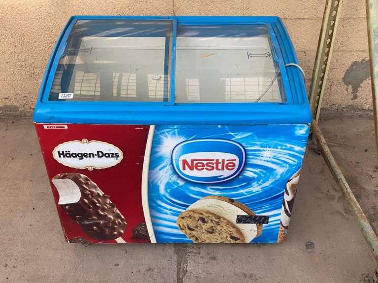 Nestlé ice cream display chest freezer. - Sierra Auction Management Inc