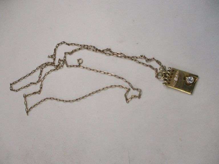 14k yellow gold notebook pendant with 7 diamonds - Sierra Auction ...