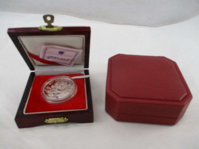 2 empty cases with 1991.999 1oz silver panda coin - Sierra Auction ...