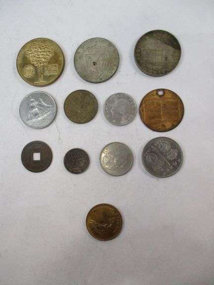 12 misc. foreign coins and tokens - Sierra Auction Management Inc