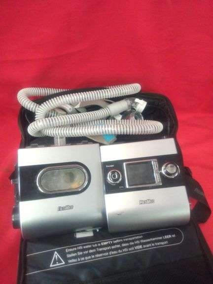 ResMed S9 Escape CPAP machine. - Sierra Auction Management Inc