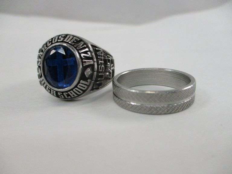 2 metal rings including 1 class ring - Sierra Auction Management Inc