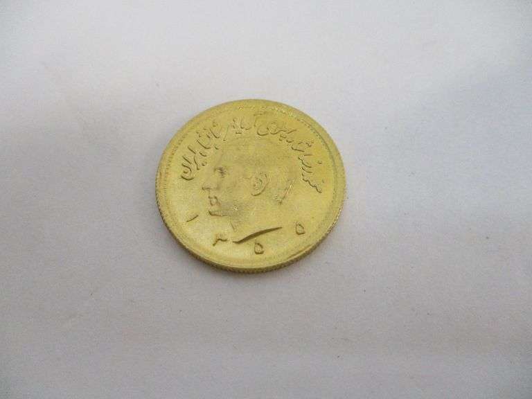 0.9000 Iran 1 Pahlavi Gold Coin - Sierra Auction Management Inc