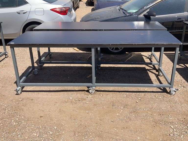 (2) 8 foot lockable wheel metal based work tables. - Sierra Auction ...