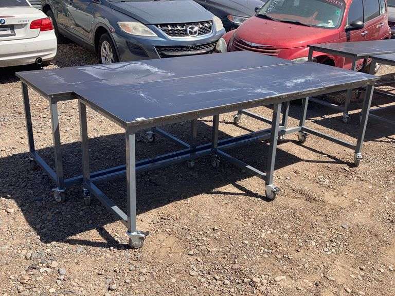 (2) 8 foot locking wheel metal-based work tables. - Sierra Auction ...