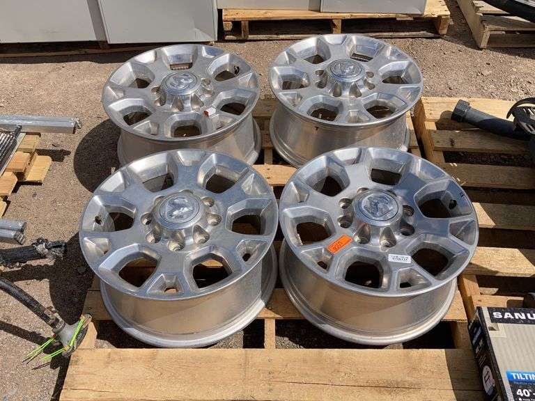 (4) Dodge ram rims. - Sierra Auction Management Inc