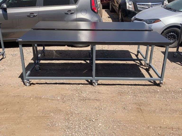 (2) 8 foot lockable wheel metal based work tables. - Sierra Auction ...