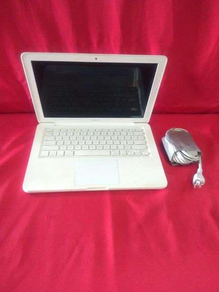 Apple Laptop Model :A1342 With Charger Included - Sierra Auction ...