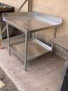 Stainless steel two tier corner prep table. - Sierra Auction Management Inc