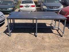 (2) 8 foot locking wheel metal-based work tables. - Sierra Auction ...
