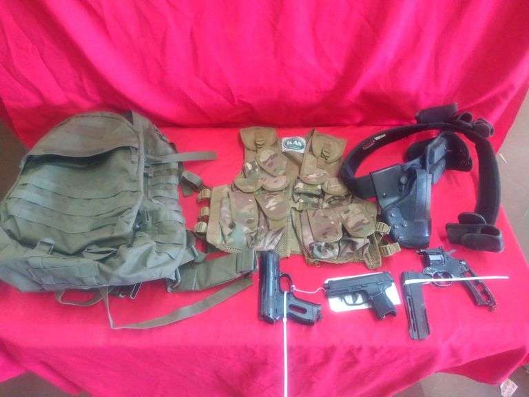 Box of Assorted Items Including BB Gun , Backpack, Rifle Case and More ...