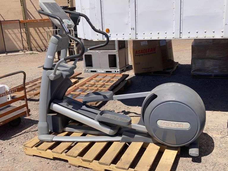Precor elliptical machine. - Sierra Auction Management Inc