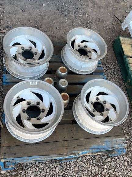 Set of 4 Old School 16” Rims With Caps - Sierra Auction Management Inc