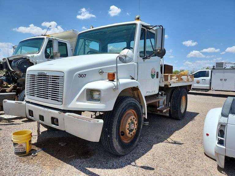2001 Freightliner FL70 Flatbed Truck - Sierra Auction Management Inc