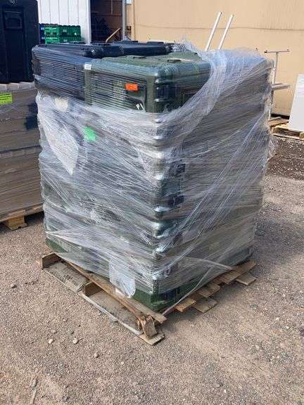 Approximately eight military style hard plastic cargo containers ...