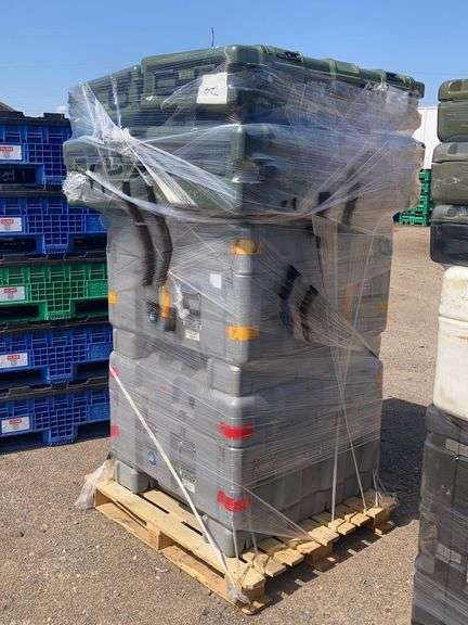 Approximately six military style hard plastic cargo containers ...