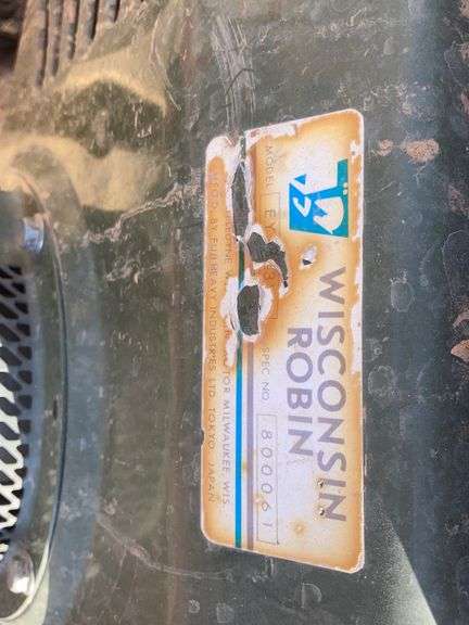 Wisconsin Robin water pump with hose. - Sierra Auction Management Inc