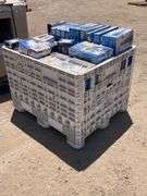 Plastic bulk container with large quantity of DVD players and cordless ...