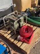 Wisconsin Robin water pump with hose. - Sierra Auction Management Inc
